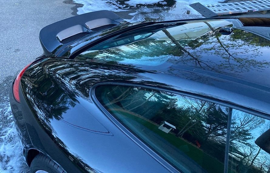 Getty Design 997.2 Ducktail Sport painted 041 black with OEM Sport ...