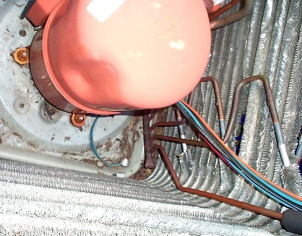 A sensor fell off my outdoor heat pump unit, but unit works fine ...