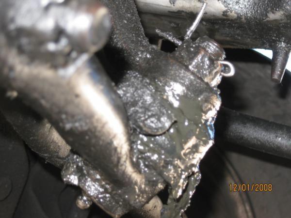 Patching up ruptured grease boot doesn't really work - DoItYourself.com ...
