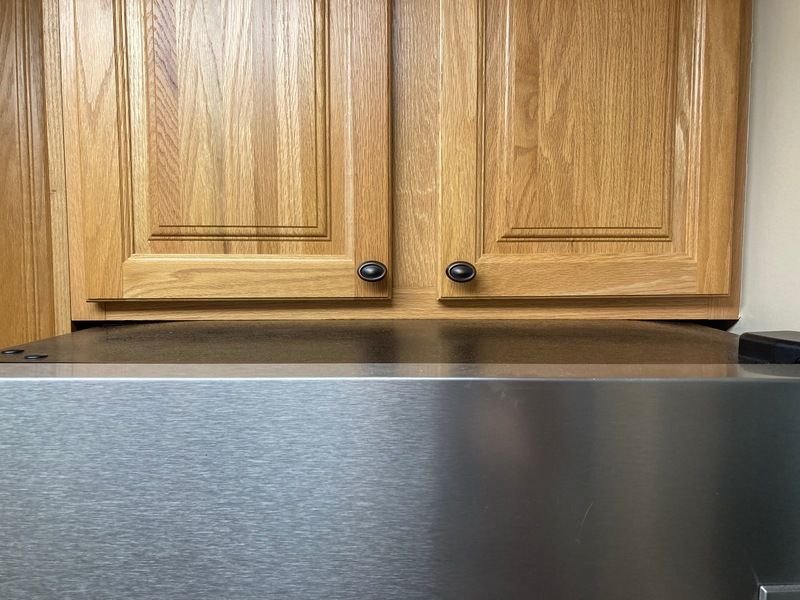 Fridge bulging on top - DoItYourself.com Community Forums