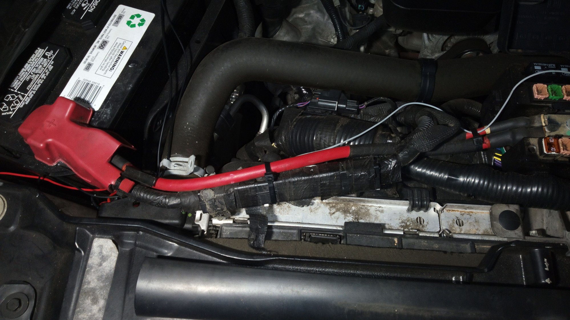 Need the power distribution schematic from the battery to the fuse box ...