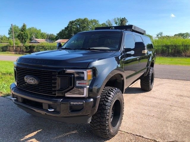 2002 7.3 4x4 with McNeil Racing kit....Pirate4x4_camo Procomp lift ...